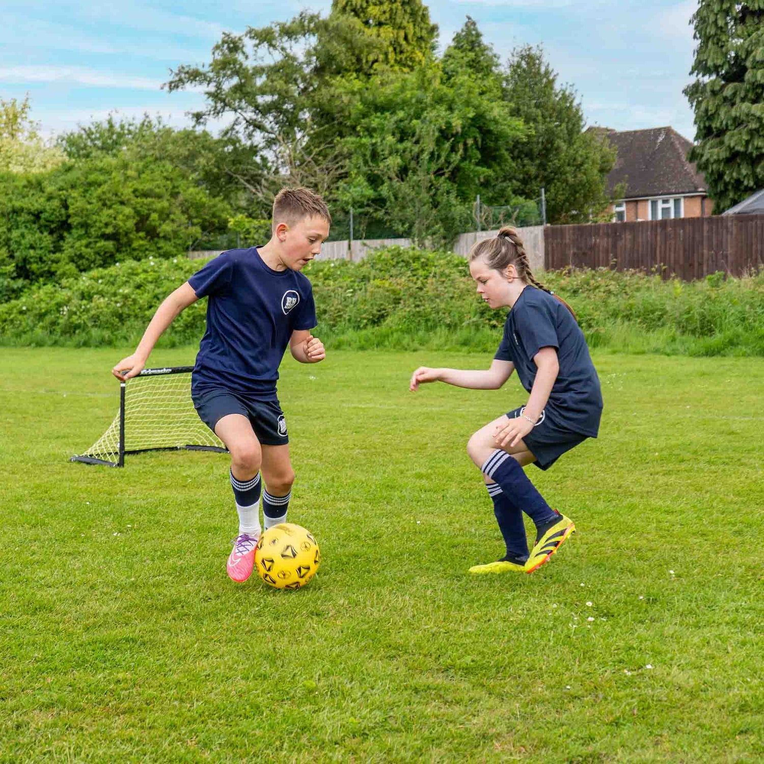 Kickmaster One on One Folding Football Goal Set – Sweatband